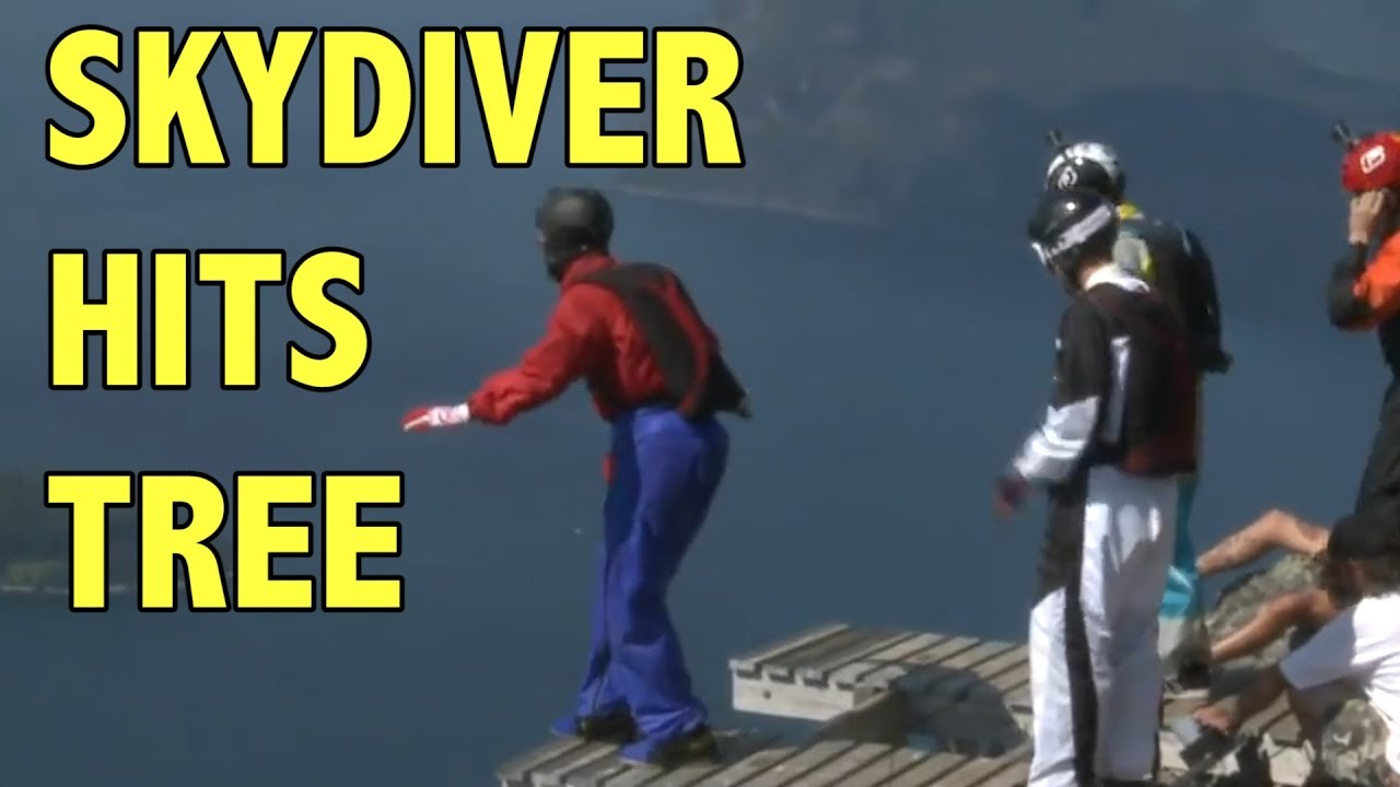 Wing Suit man Parachute fails into tree | skyxtreme.tv